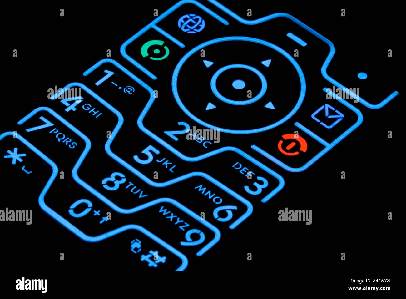 Illuminated modern mobile phone keypad against black background angled ...