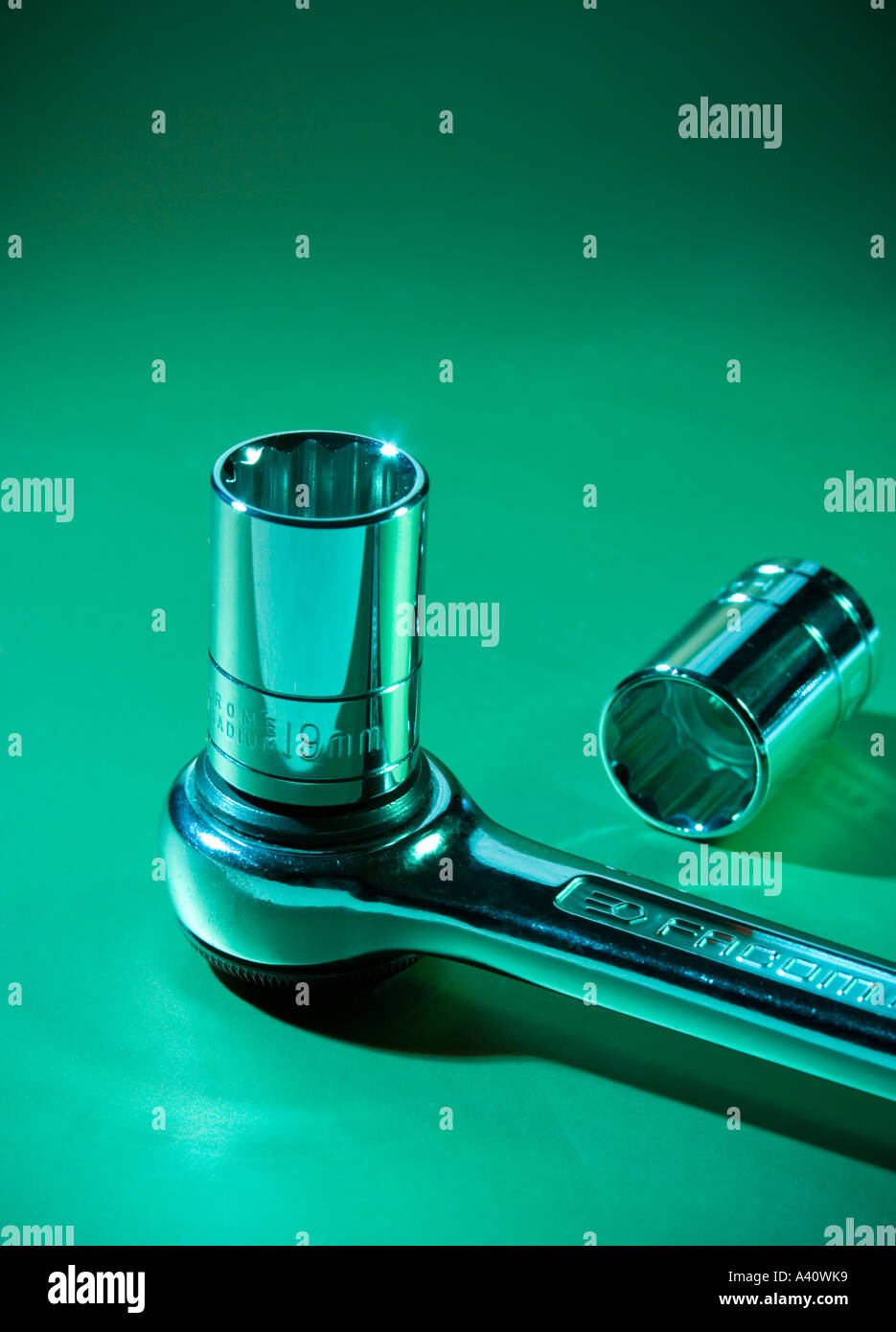 Socket driver and 2 two sockets. Green lighting Stock Photo - Alamy