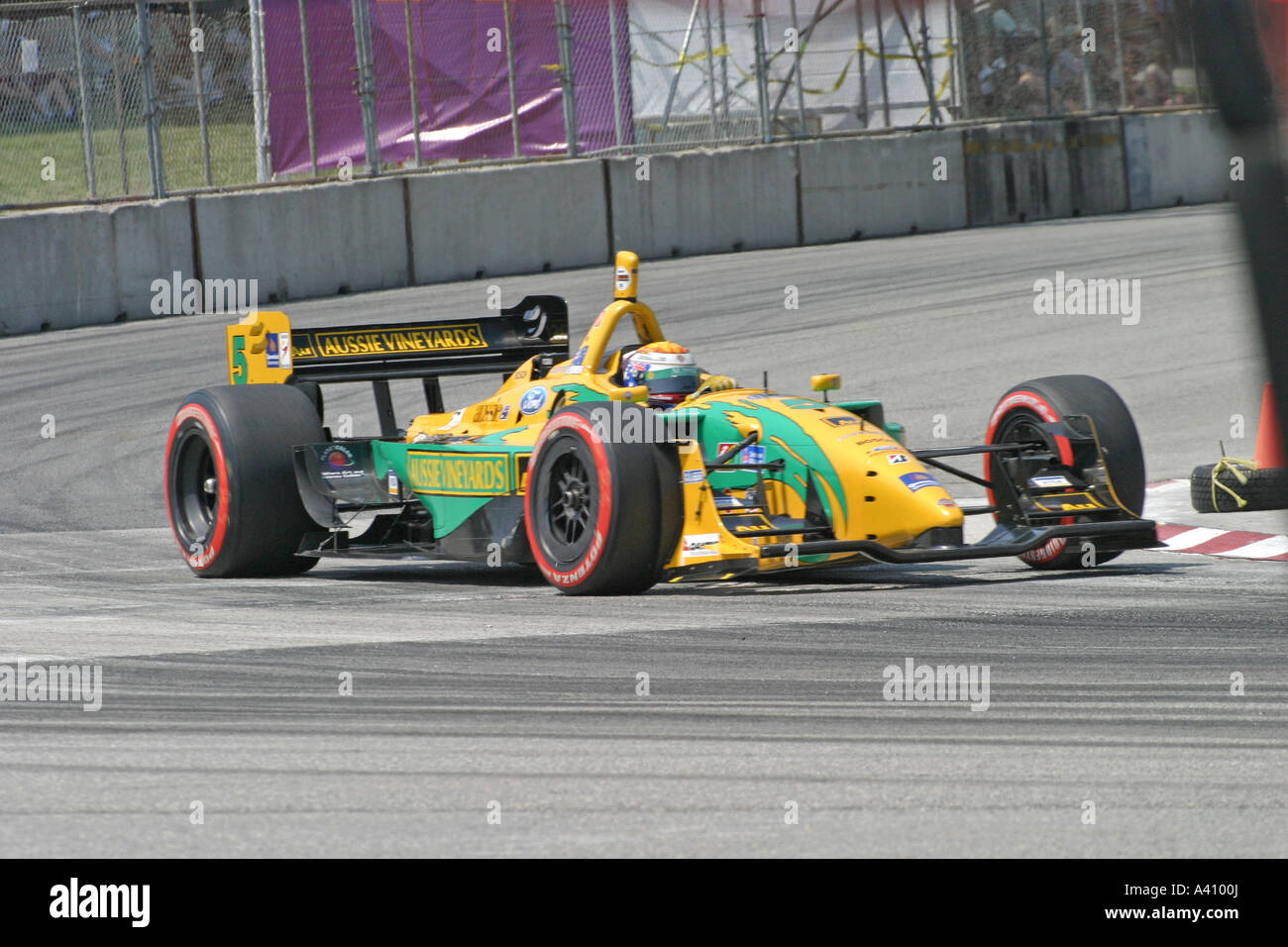 Yellow red race car speeding around hi-res stock photography and images ...