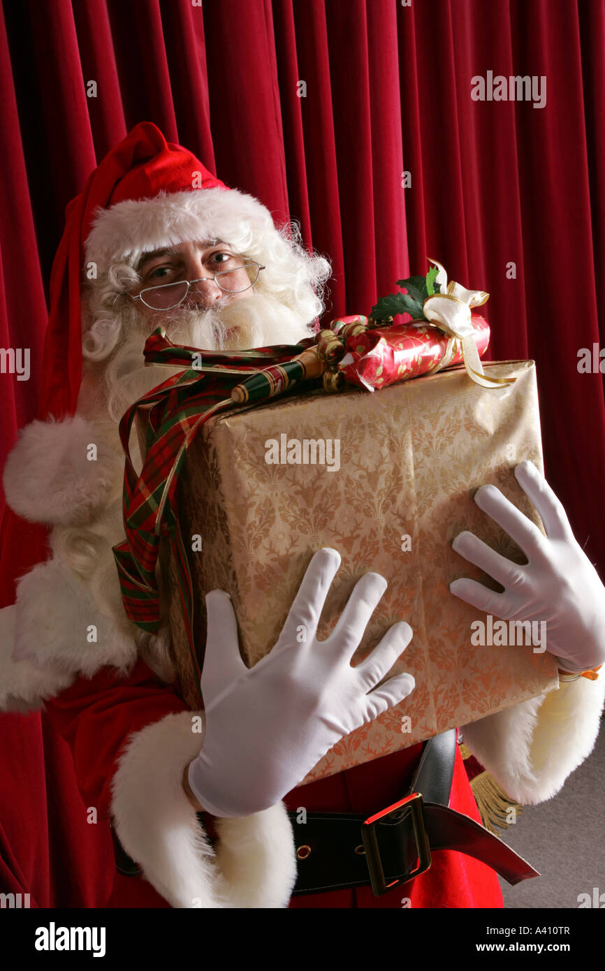 Father Christmas with presents Stock Photo - Alamy