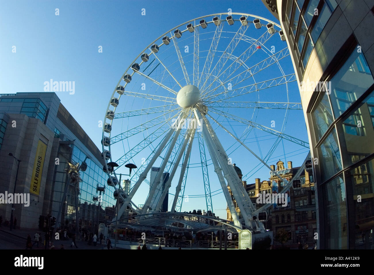 The Manchester Wheel January 2006 reflected in Selfridges store front ...