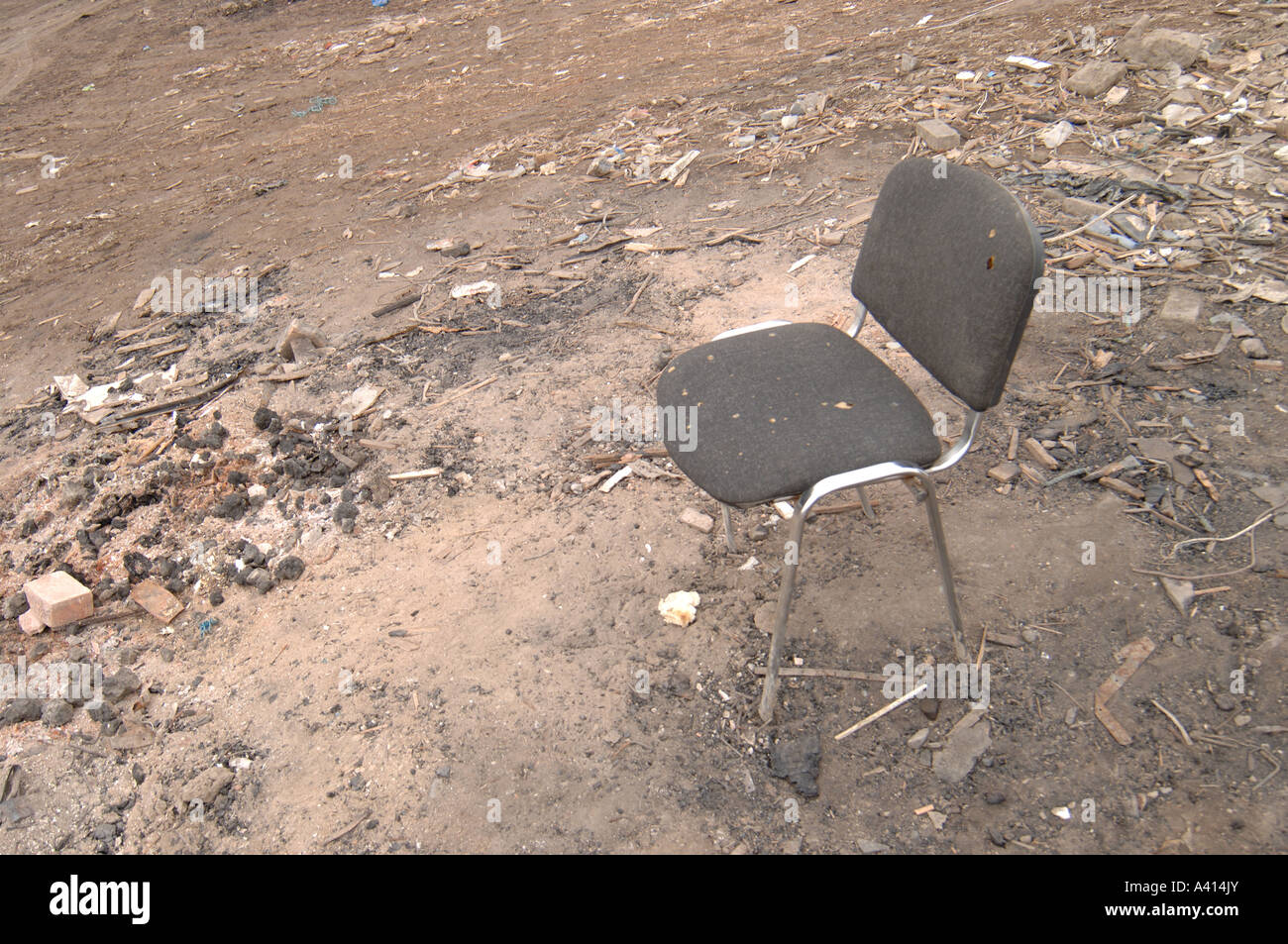 chair abandoned on waste ground Stock Photo - Alamy