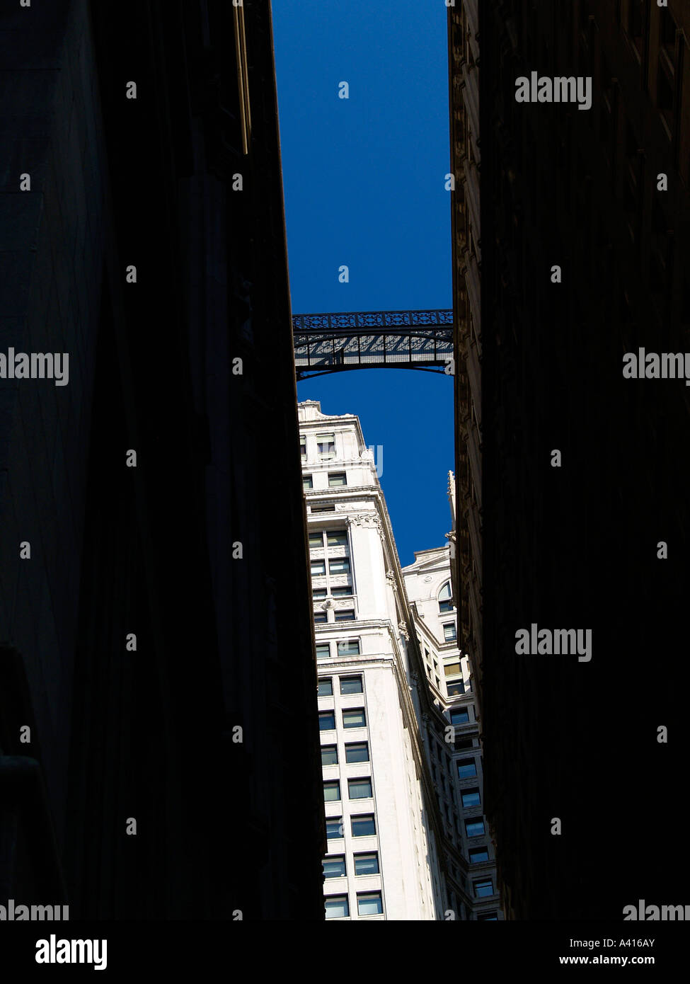 The sky seen between tall buildings New York City United States of ...