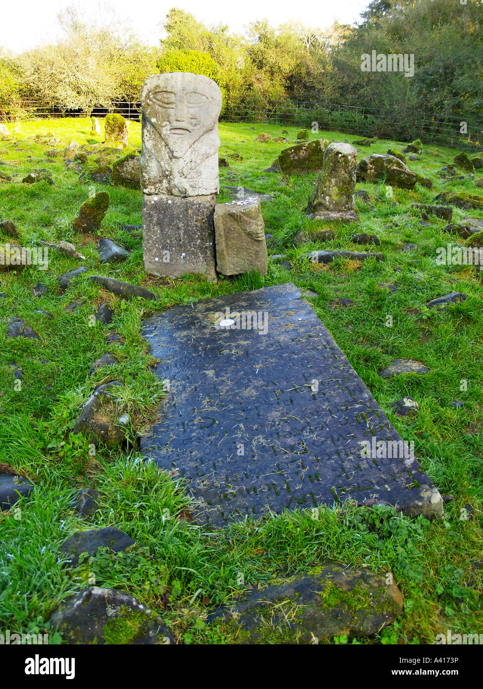 Pagan celtic stone janus head figure hi-res stock photography and ...