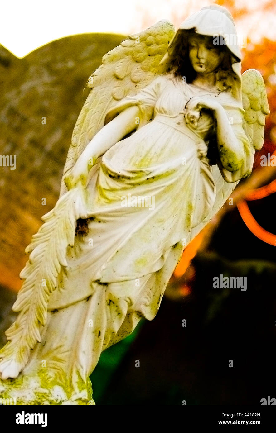 Female angel statue with clouds hi-res stock photography and images - Alamy