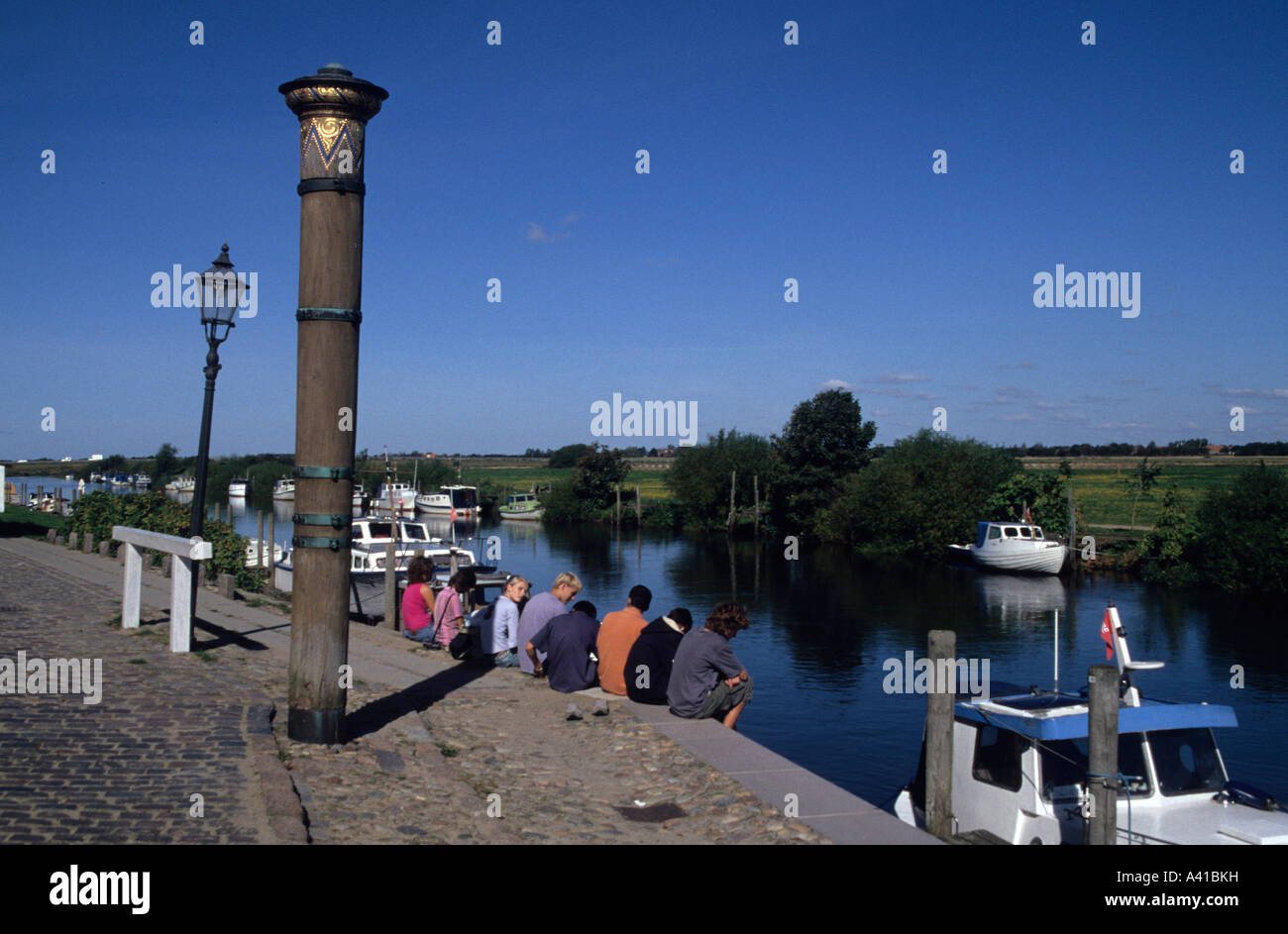 Pole marking the levels reached by previous floods over the centuries ...