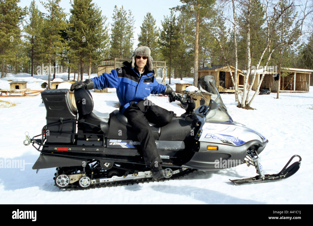 Swedish tourist and snowmobile in Swedish Lapland Sweden Stock Photo ...