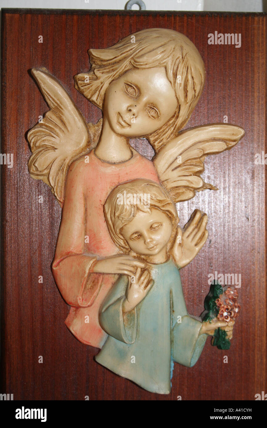 wall plaque of angels Stock Photo - Alamy