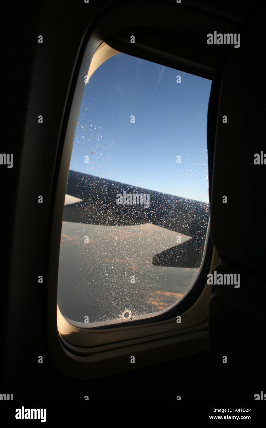 aeroplane window looking out Stock Photo - Alamy