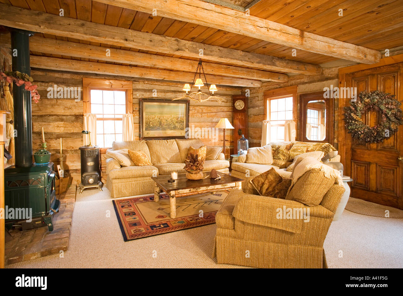 living room in log house Stock Photo - Alamy