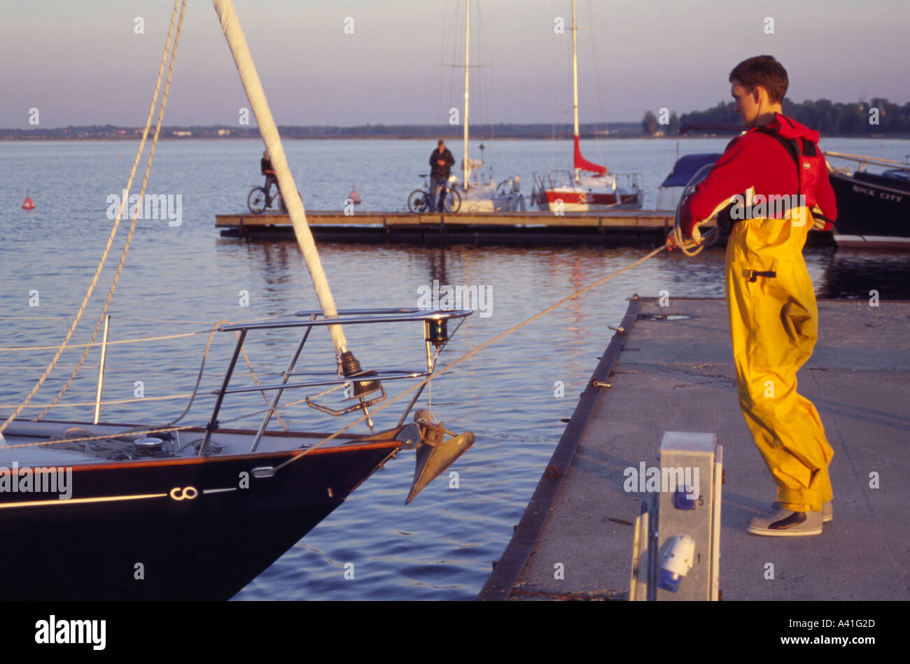 Picking up a mooring buoy mooring in the Baltic style Stock Photo - Alamy