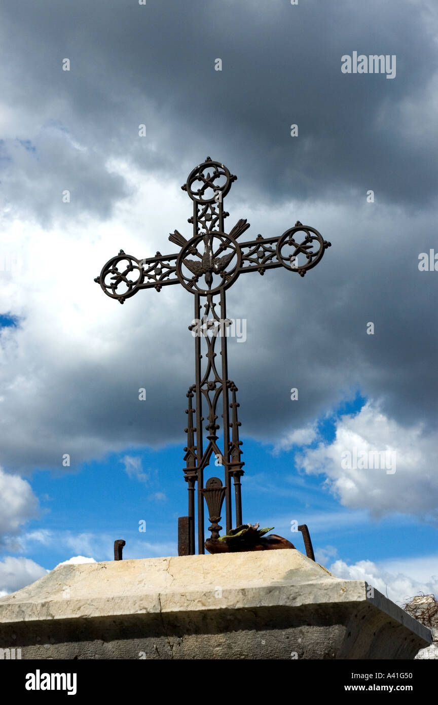 Iron Cross on a Stone plinth the churchyard of St Denis church Tourtour ...