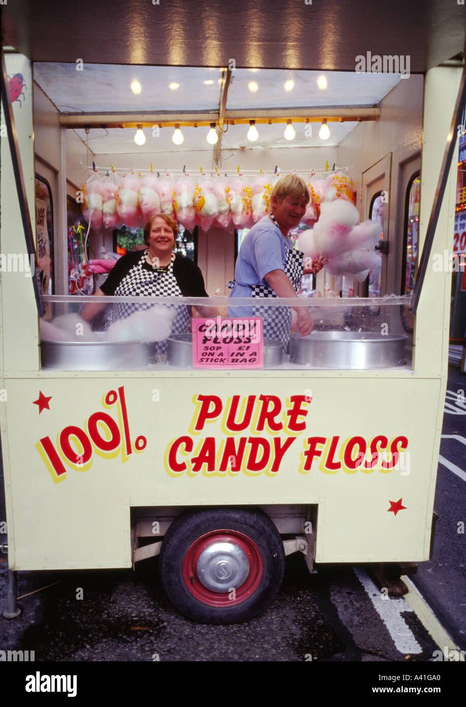 Selling candy floss from a two wheeled trailer at St Giles Fair in ...