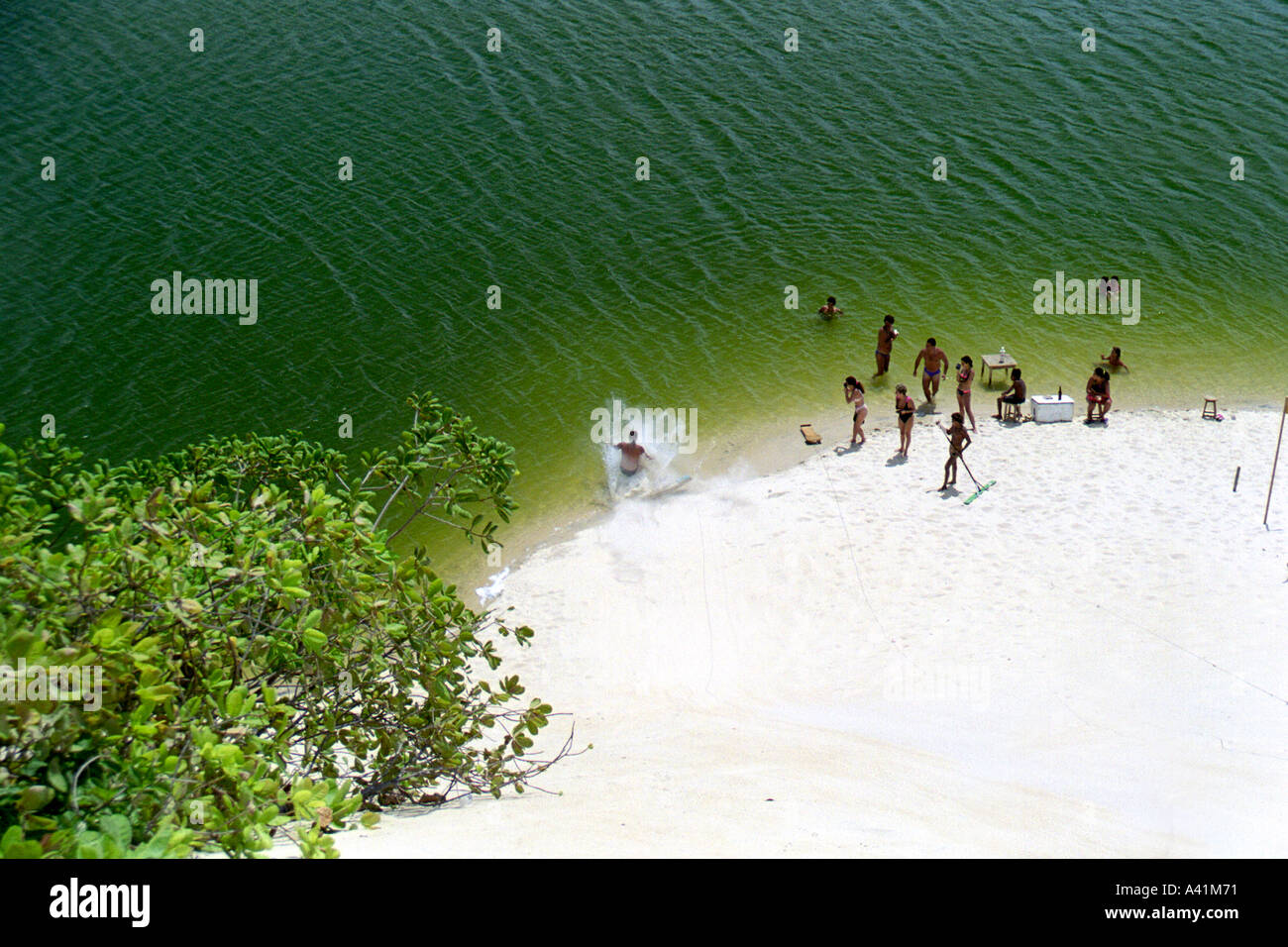 People Sliding Board on Dunes - Sand Boarding Stock Photo - Alamy