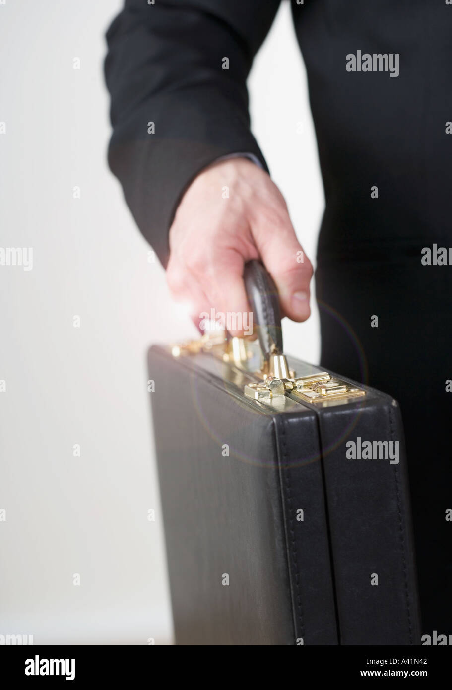 Briefcases carry hi-res stock photography and images - Alamy