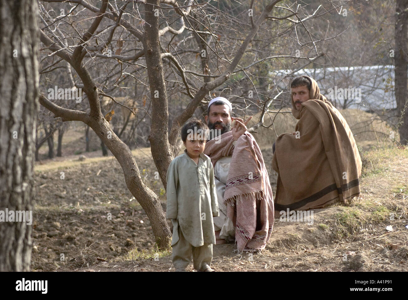 Boy and his father Pakistan Stock Photo - Alamy