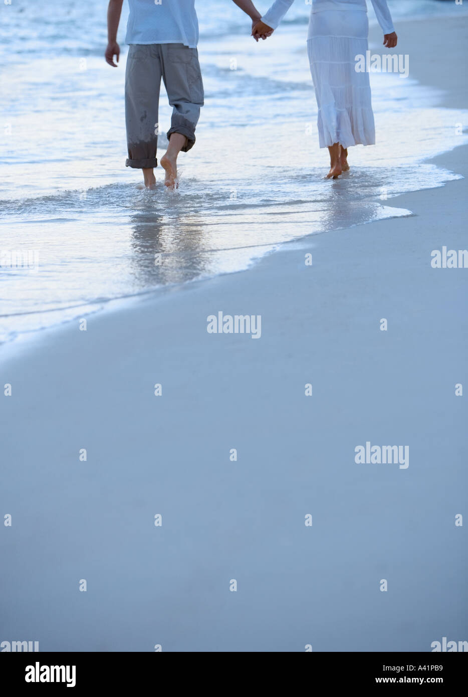 Young couple stroll along hi-res stock photography and images - Alamy