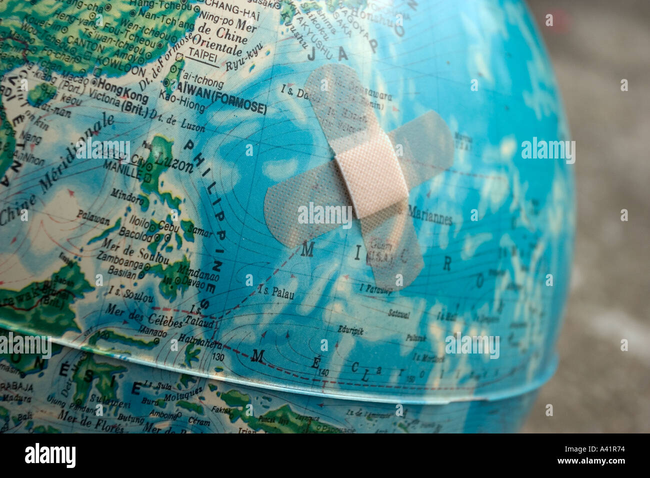 earth globe with bandage Stock Photo - Alamy