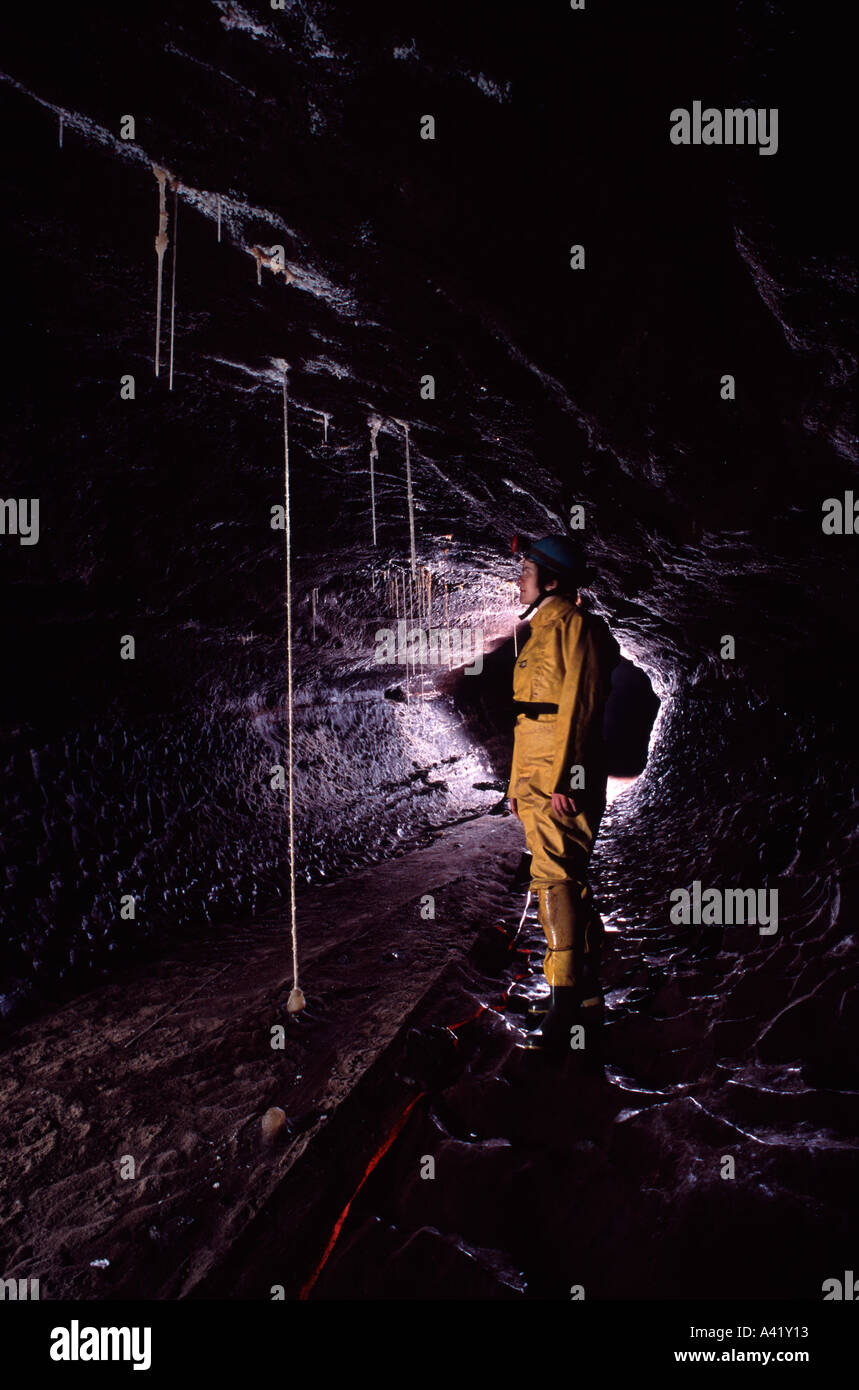 A female caver in Flabbergasm Oxbow Dan yr Ogof Brecon Beacons South ...
