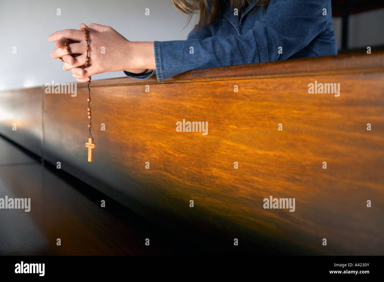 Woman praying alone hi-res stock photography and images - Alamy