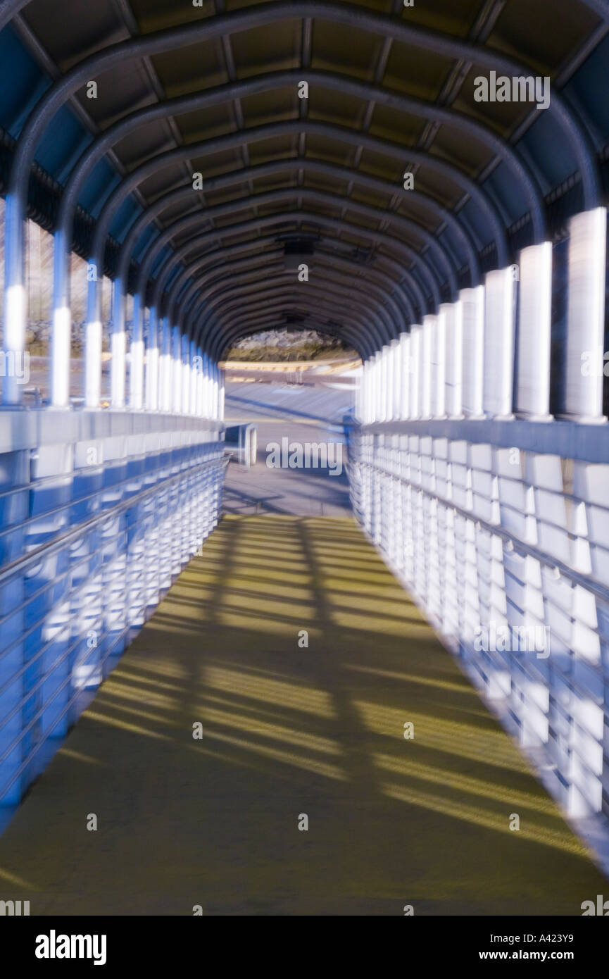 Looking down boat ramp tunnel blurred motion effect Stock Photo - Alamy