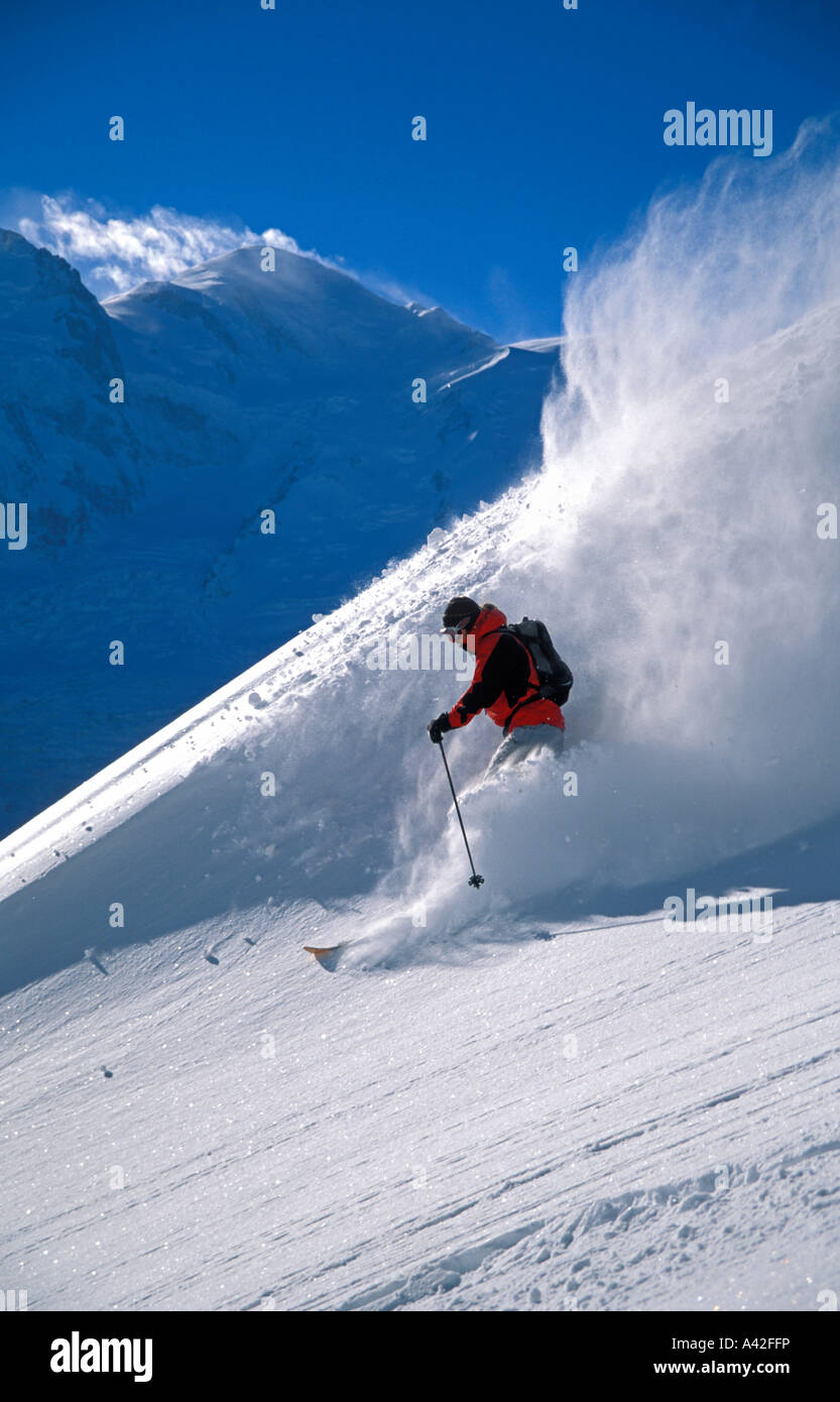 Skier at Le Brevant Chamonix France with the rounded top of Mont Blanc ...