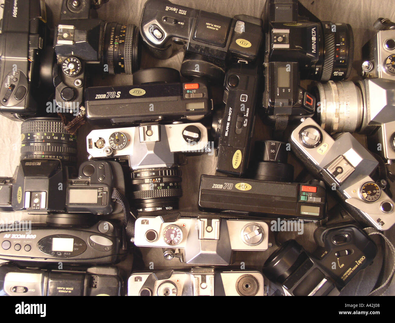 Pile digital cameras hi-res stock photography and images - Alamy