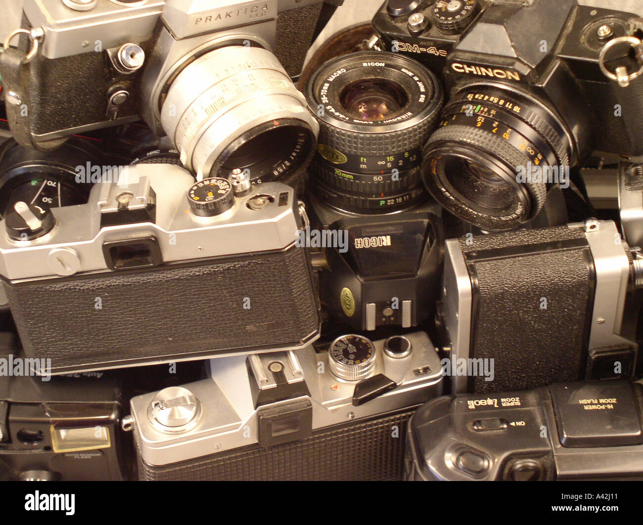 Pile of broken redundant old cameras SLR single les reflex cameras ...