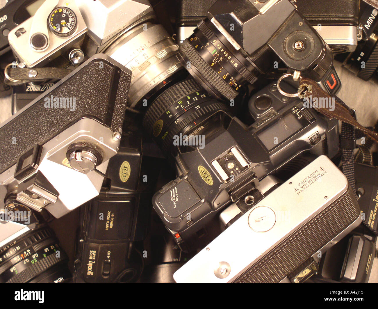 Pile digital cameras hi-res stock photography and images - Alamy