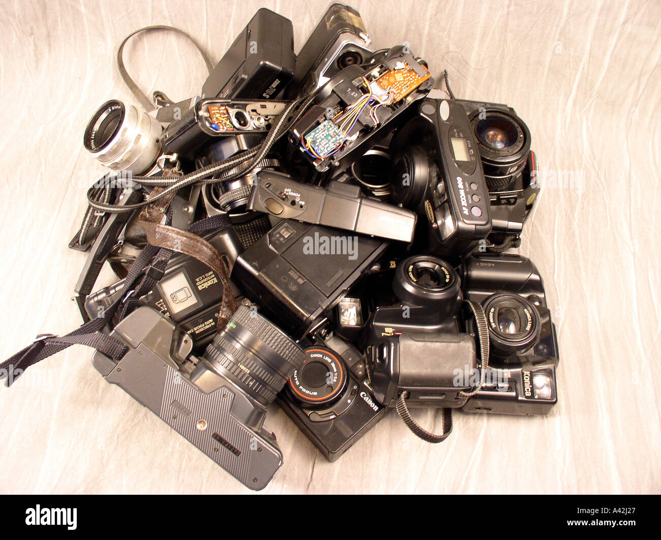 Pile of broken redundant old cameras SLR single les reflex cameras ...