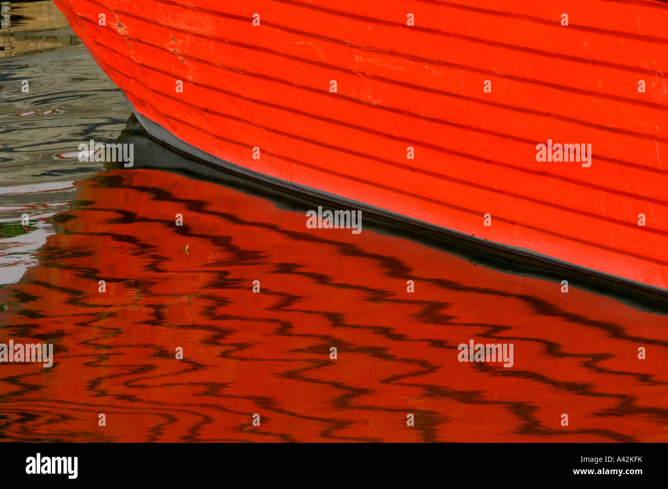 Distorted reflection boat in water hi-res stock photography and images ...