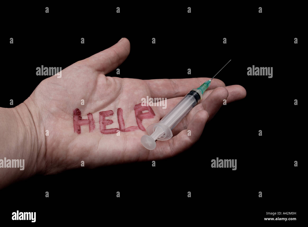 Human Hand with Syringe Concept drug addiction Stock Photo - Alamy