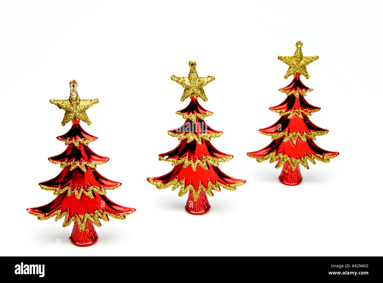 Three ornamental Christmas Trees Stock Photo - Alamy