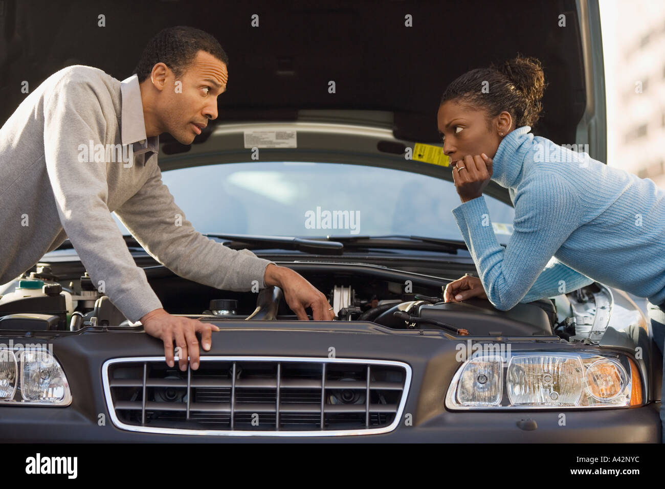 Woman leaning over car hi-res stock photography and images - Alamy