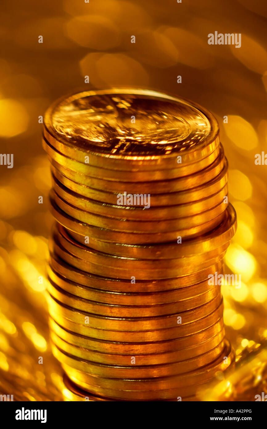 Stack of gold coins Stock Photo - Alamy