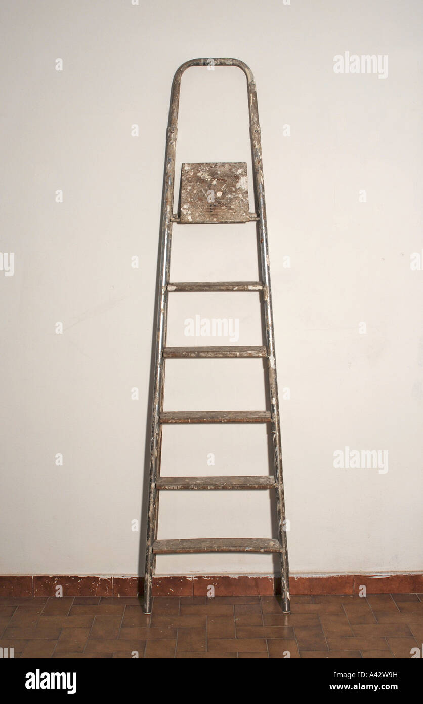 old ladder on dirty wall Stock Photo - Alamy
