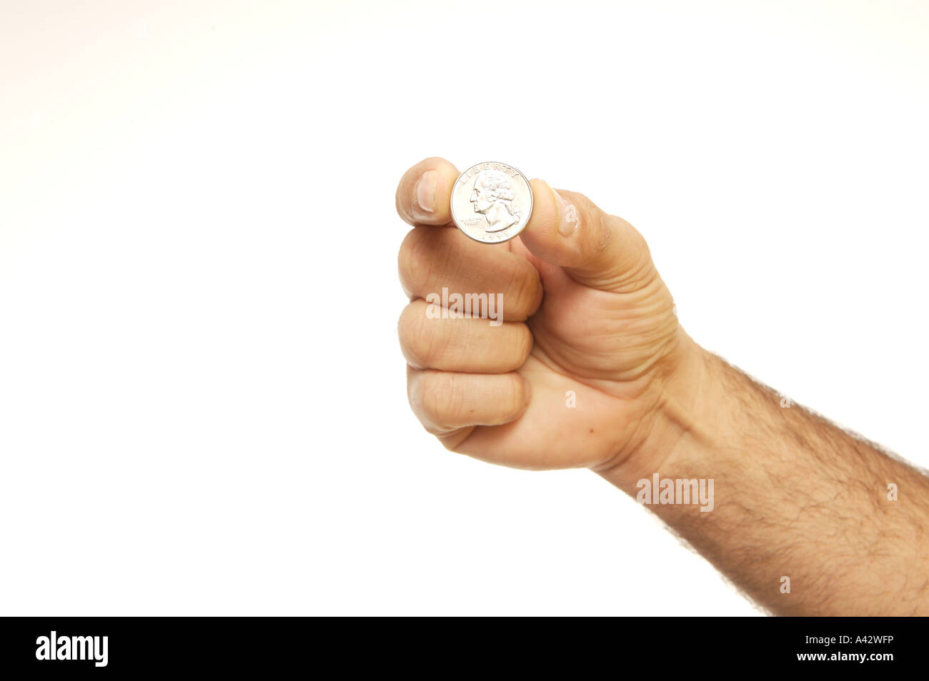 coin hand showing coin Stock Photo - Alamy