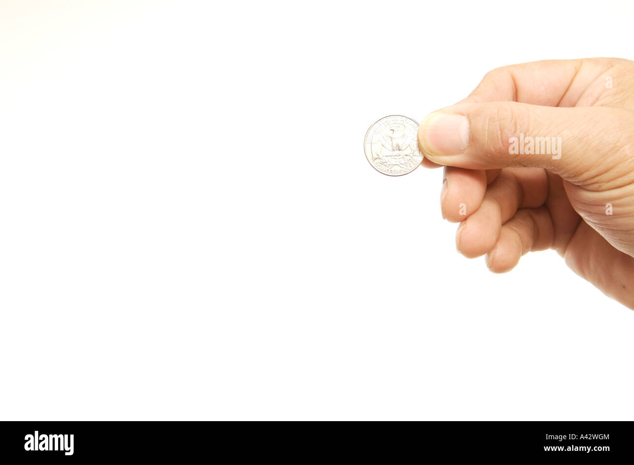 coin hand showing coin Stock Photo - Alamy