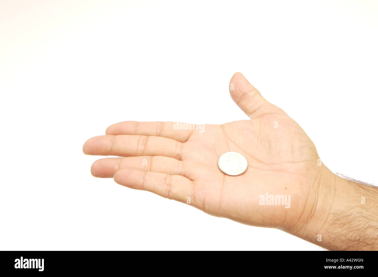 coin hand showing coin Stock Photo - Alamy