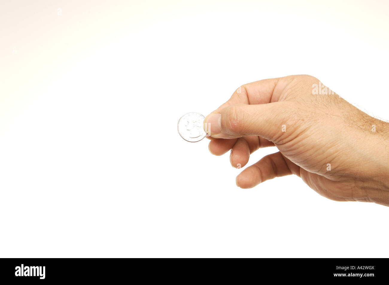 coin hand showing coin Stock Photo - Alamy
