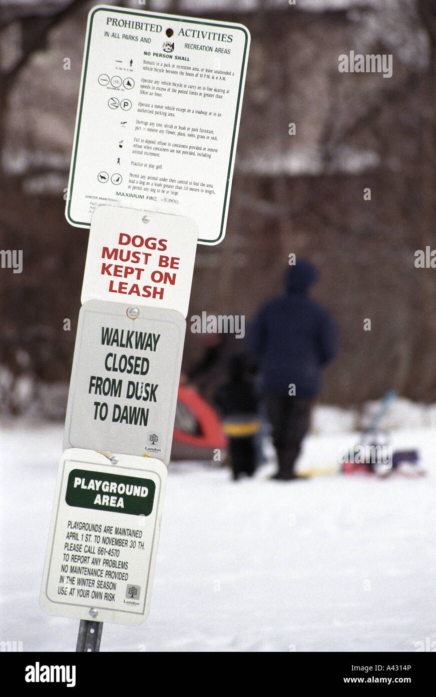 City Park Warning Signage Stock Photo - Alamy