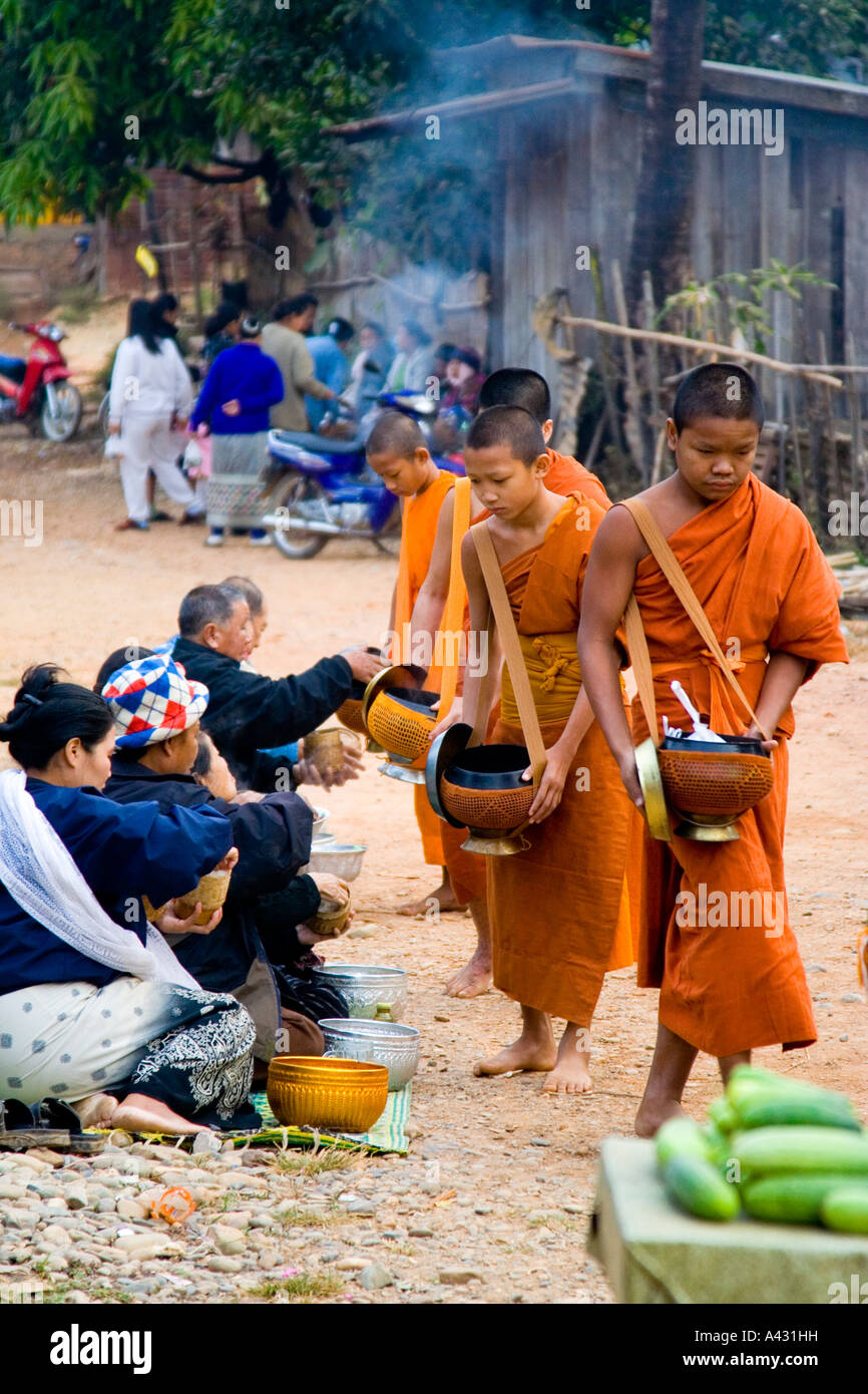 Local People Offering Food at Alms Vang Vieng Laos Stock Photo - Alamy