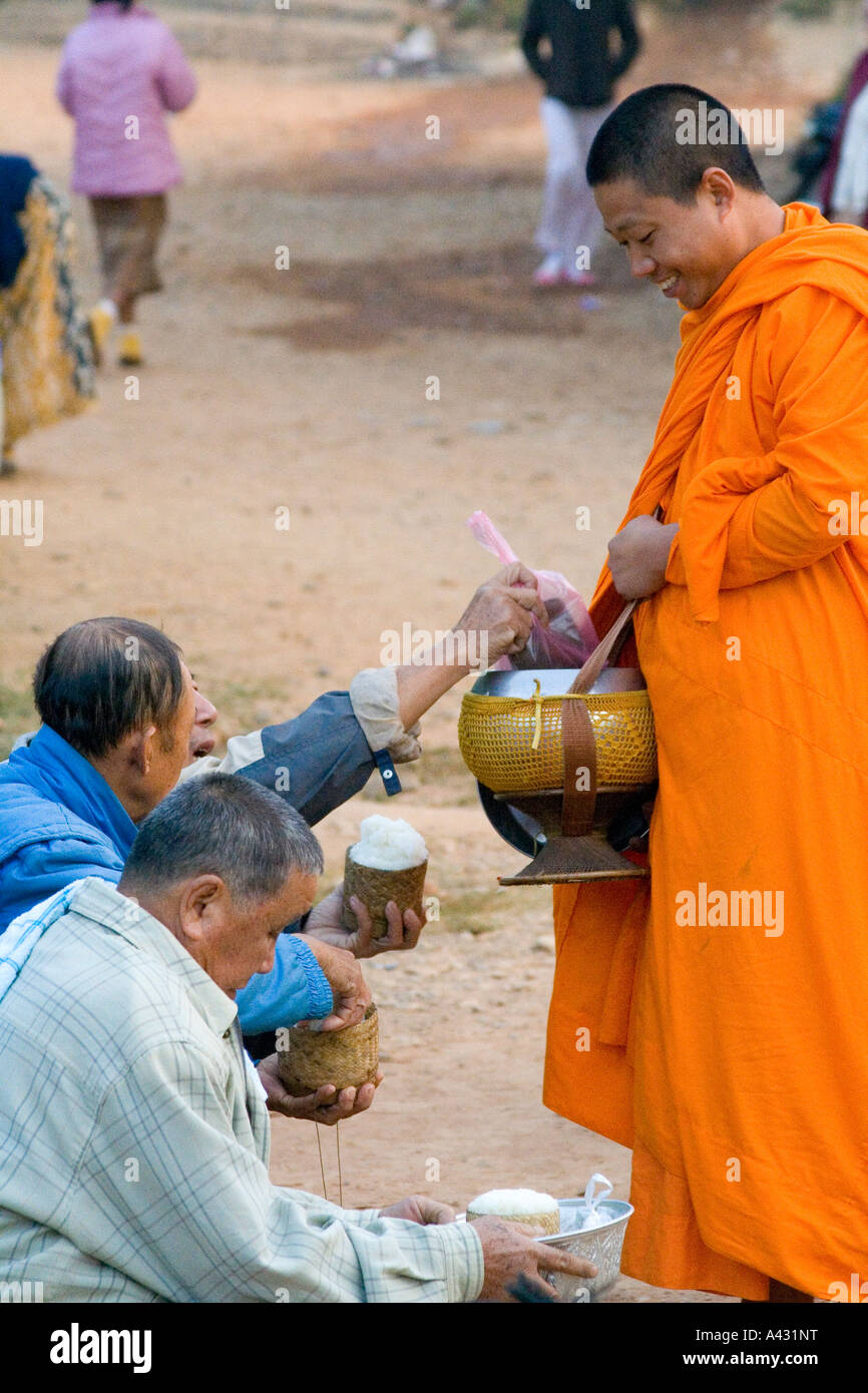 Local People Offering Food at Alms Vang Vieng Laos Stock Photo - Alamy