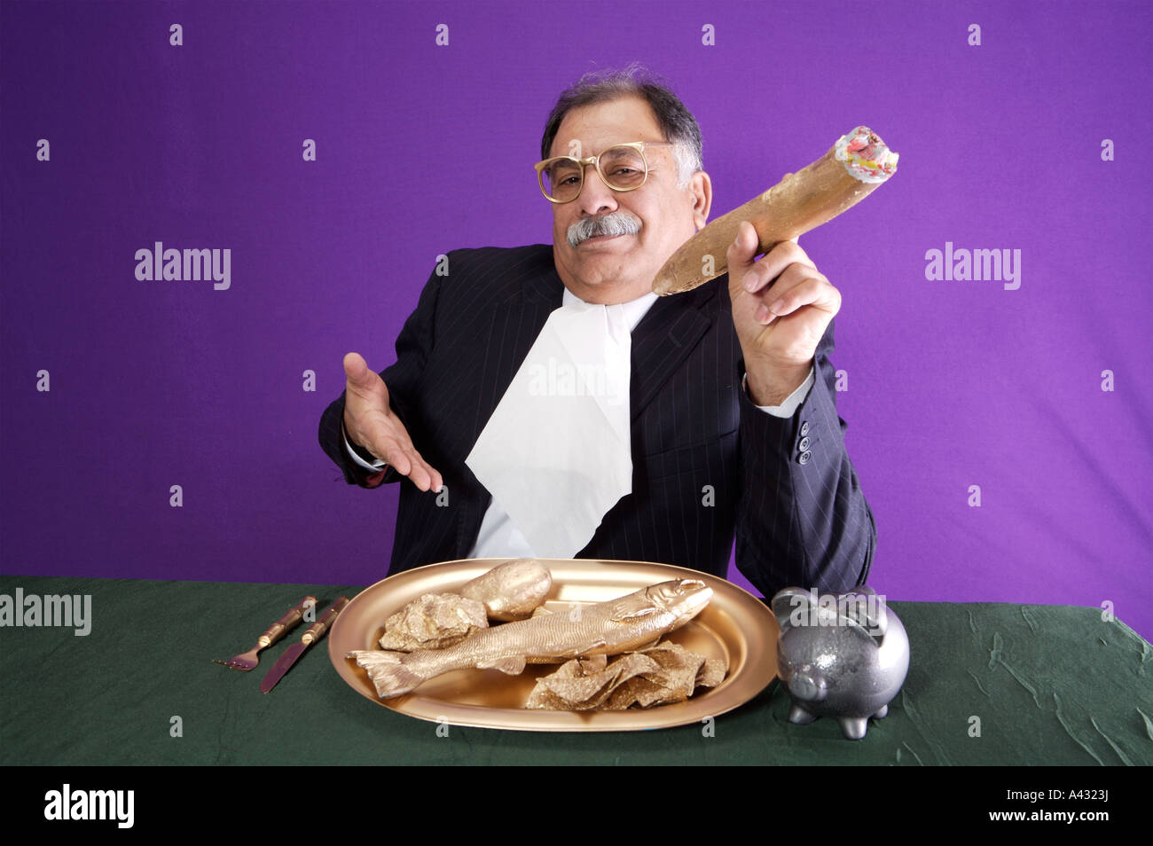 Wealthy man eating hi-res stock photography and images - Alamy