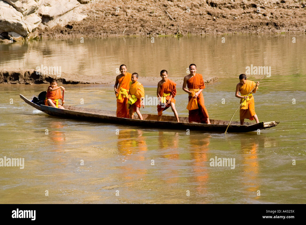 Novice Monks Cross the River in Canoe Luang Prabang Laos Stock Photo ...