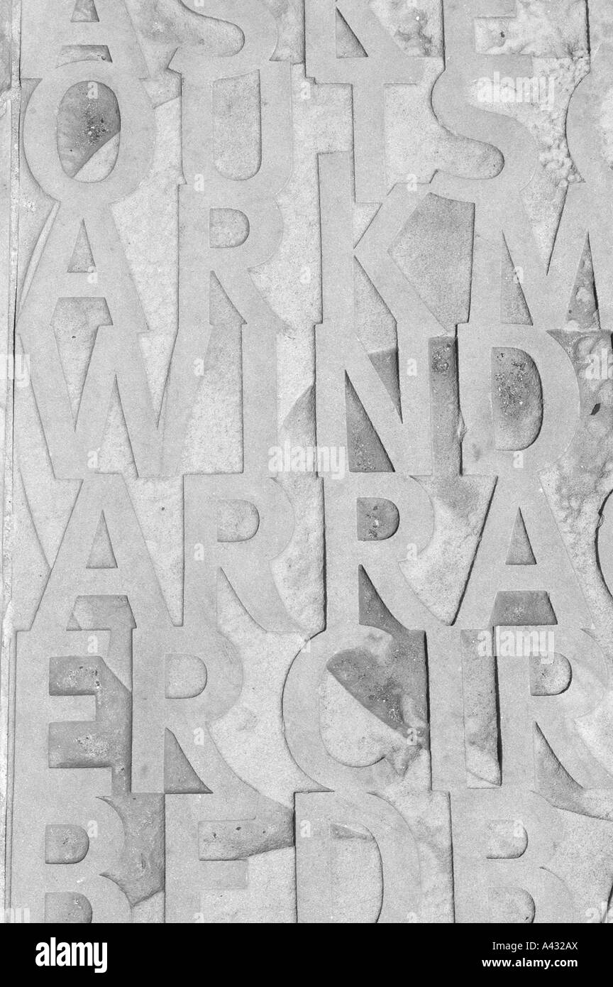 Carving of alphabet letters into pavement tiles, Melbourne Australia ...