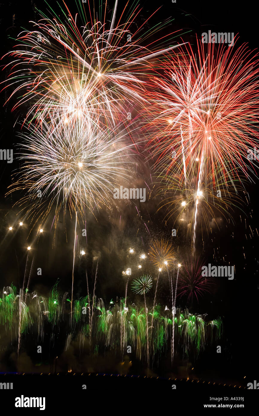 A vertical outdoors night shot of fireworks Stock Photo - Alamy