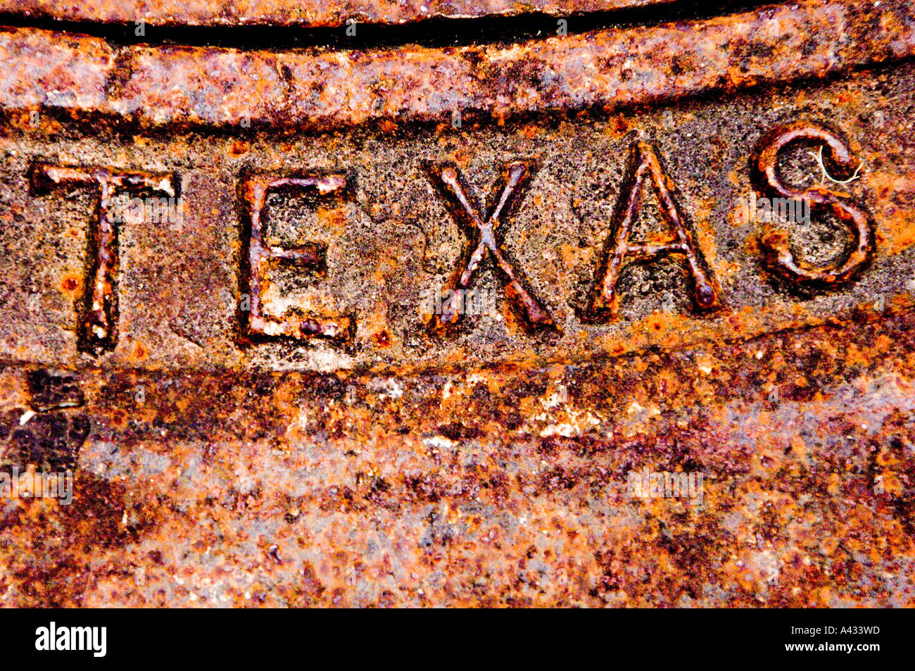 Texas text as seen on manhole cover at the University of TX Stock Photo ...