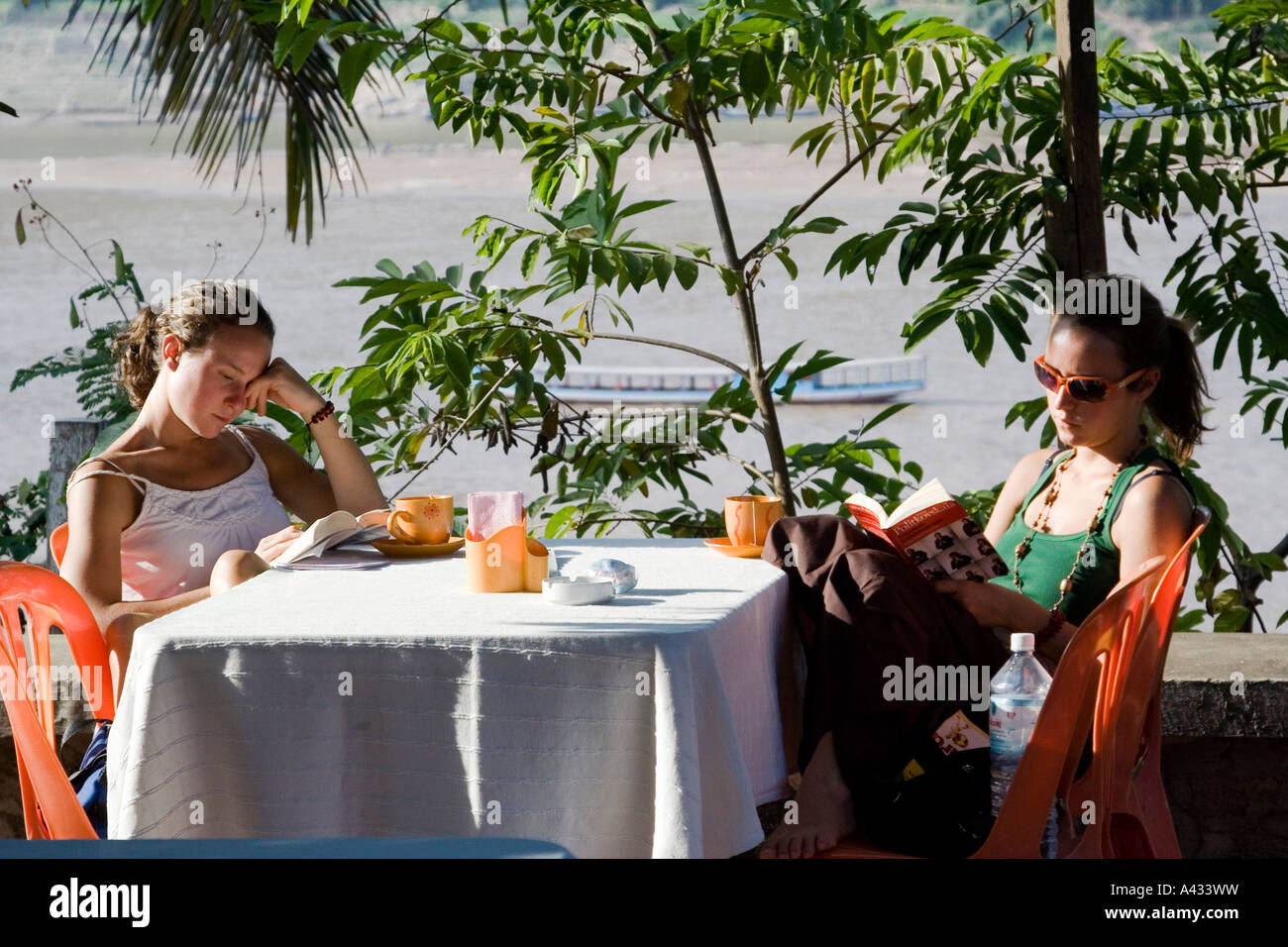 Two Young Tourists Enjoying the Mekong Riverfront Luang Prabang Laos ...