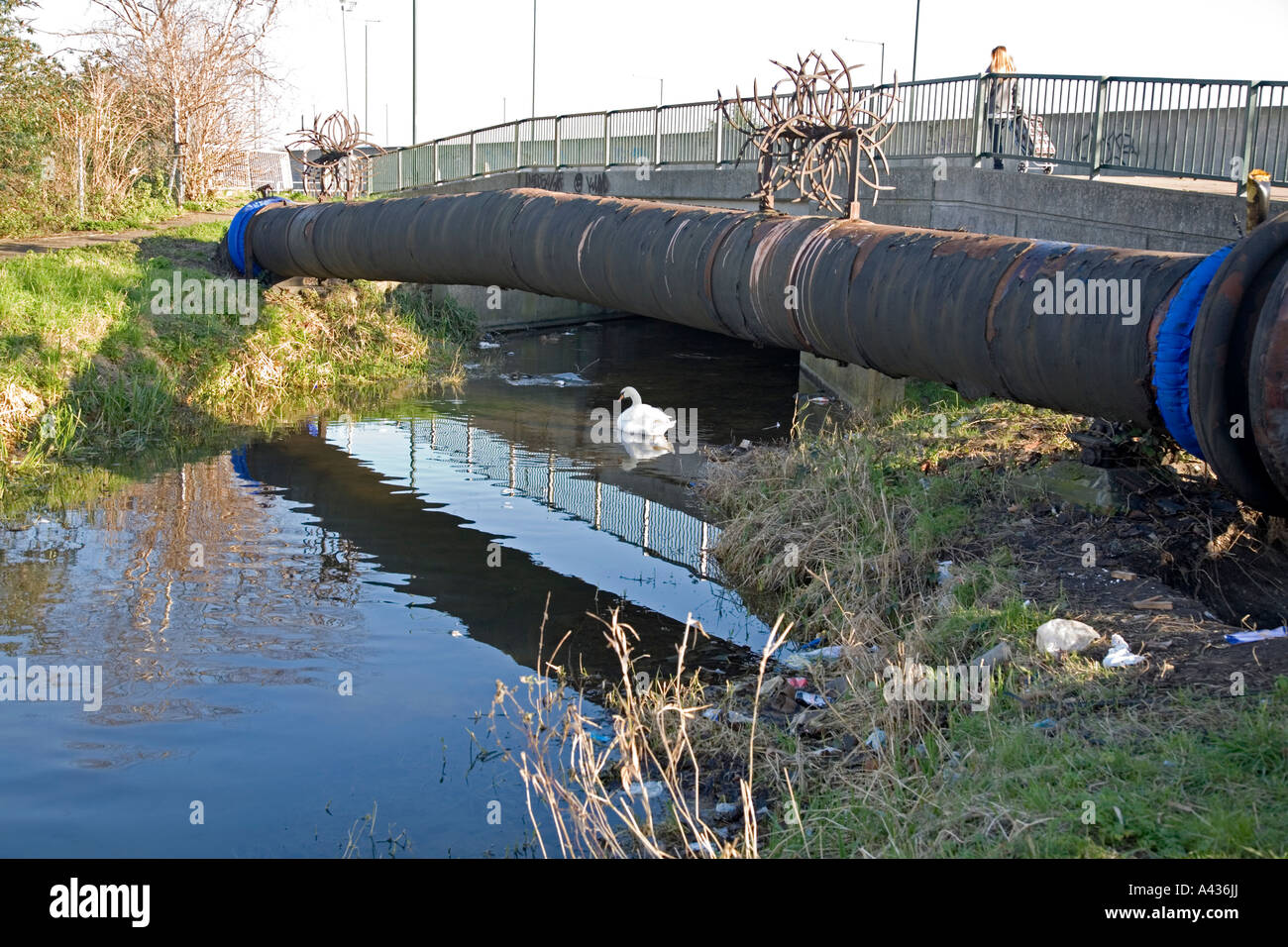 Water pipe over the Longford River water course in Hanworth Middlesex ...